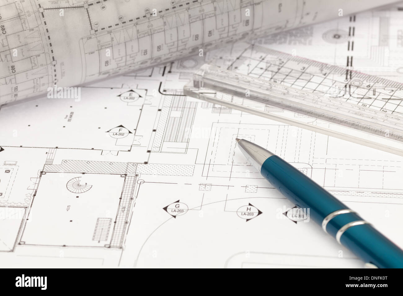 Architectural cad drawing on working table Stock Photo - Alamy