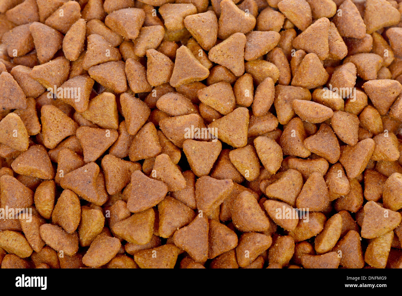 Dry cat food, background Stock Photo - Alamy