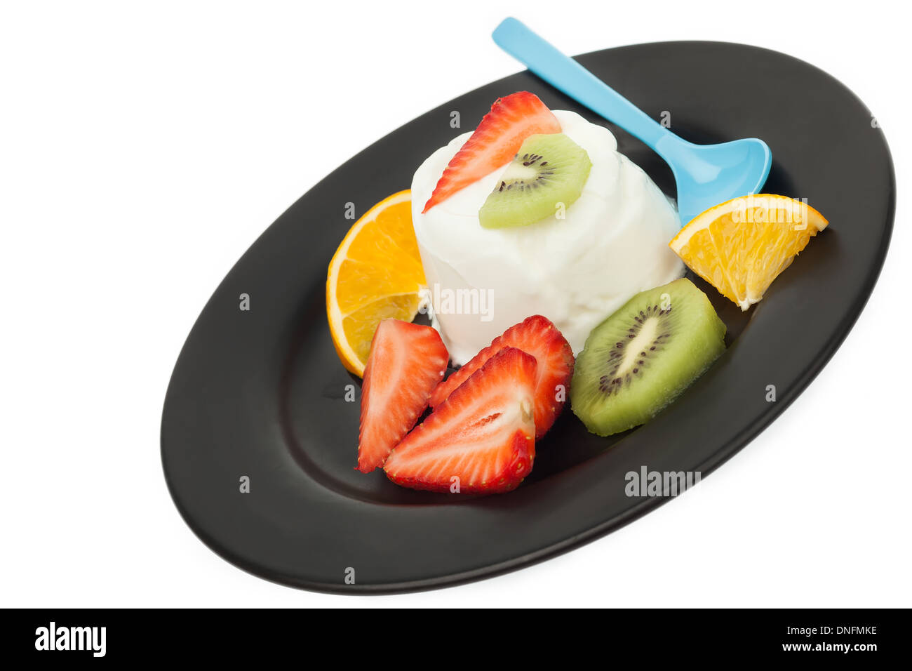 Fruits yogurt plate isolated on white background Stock Photo - Alamy