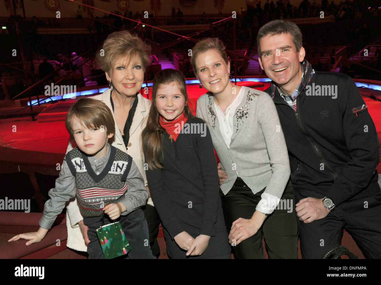 Munich, Germany. 25th Dec, 2013. Presenter Carolin Reiber (L), her ...