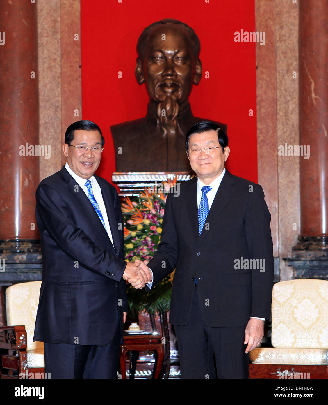 Hanoi, Vietnam. 26th Dec, 2013. Vietnamese President Truong Tan Sang (R ...