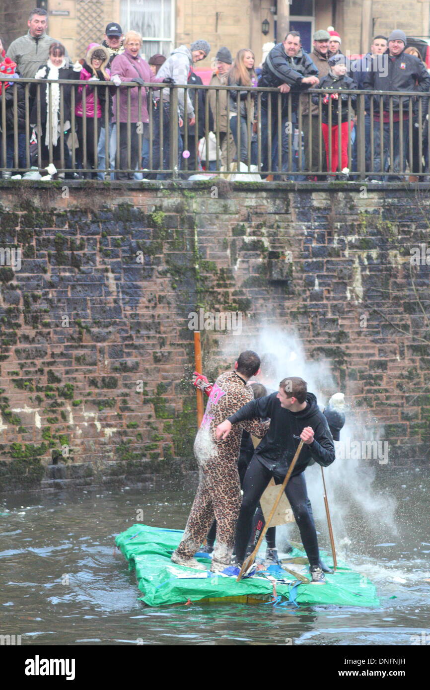 Spectators throw flour bombs at entrants of annual Boxing Day fancy ...