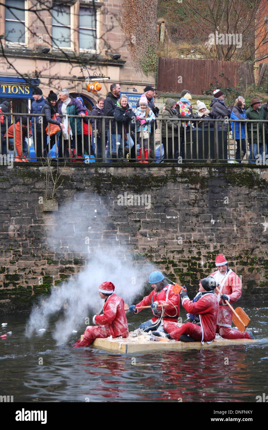 Spectators throw flour bombs at entrants of annual Boxing Day fancy ...