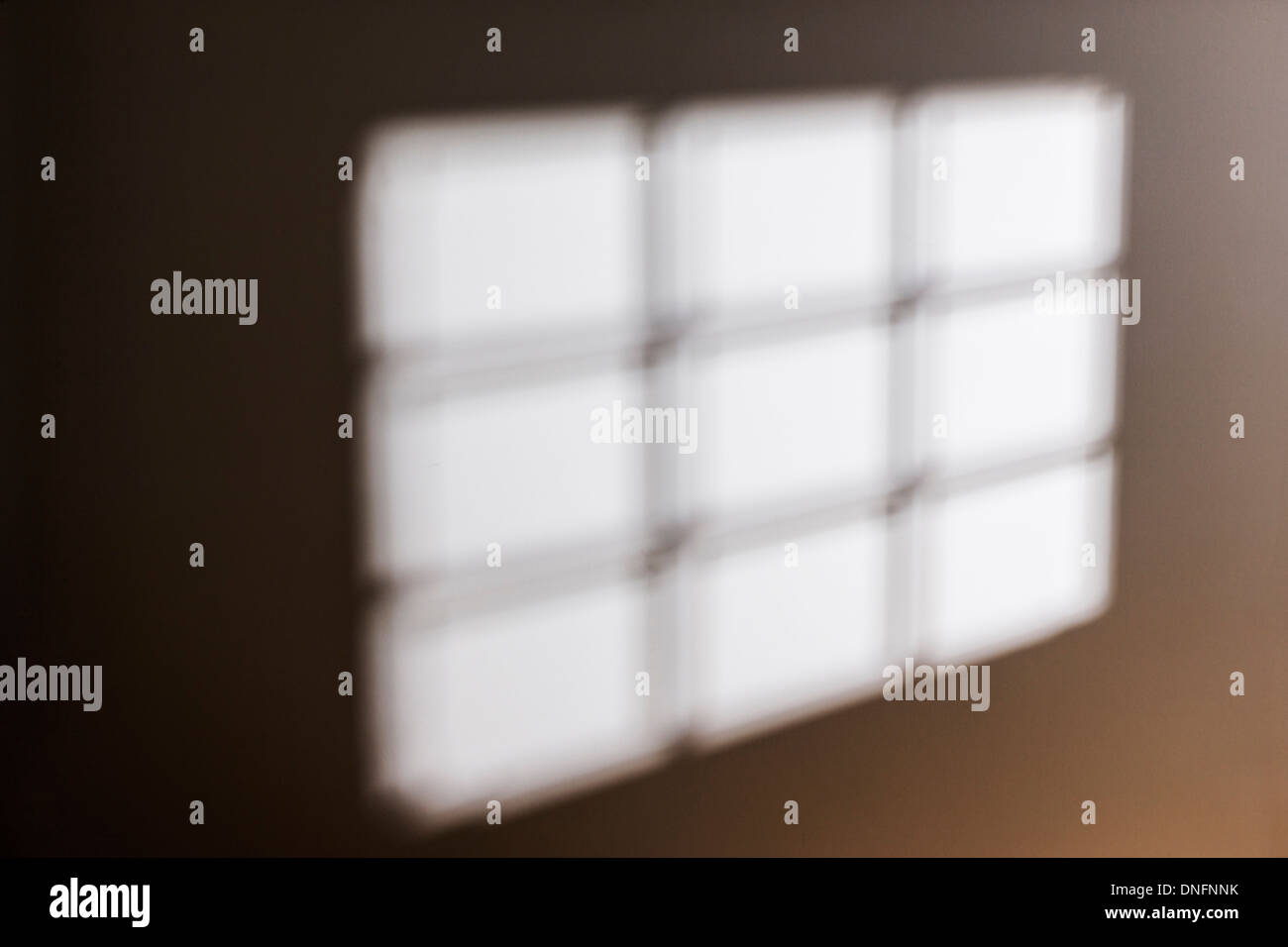Light patterns on a wall in a commercial photography studio Stock Photo ...