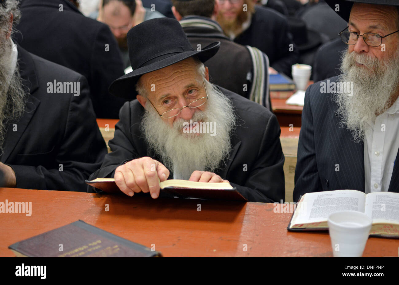 An orthodox rabbi leading a daily bible study class at Lubavitch ...