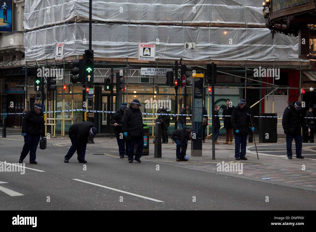 Soho London, UK. 26th December 2013. A group of police officers walk in ...