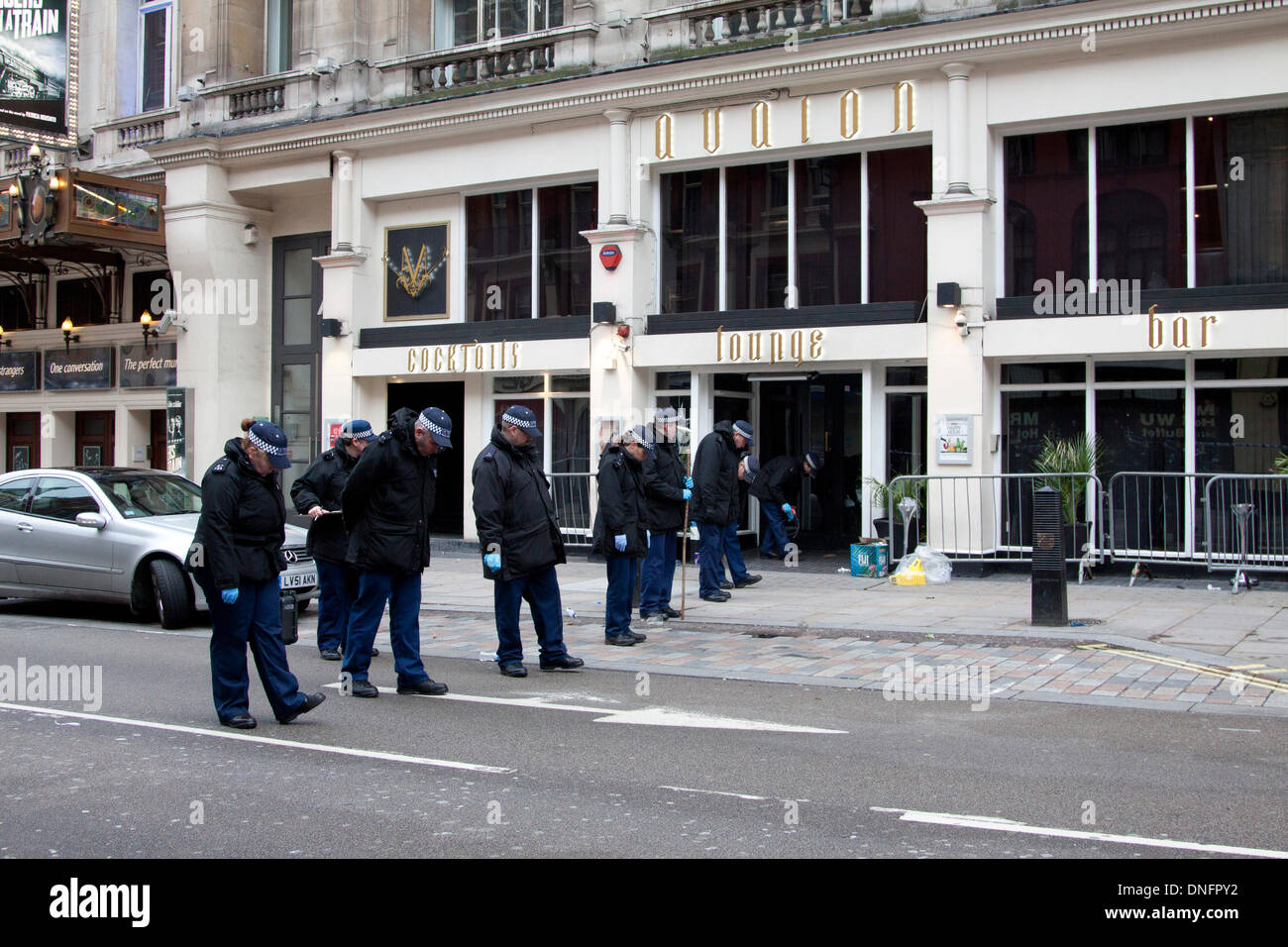 Soho London, UK. 26th December 2013. A group of police officers walk in ...
