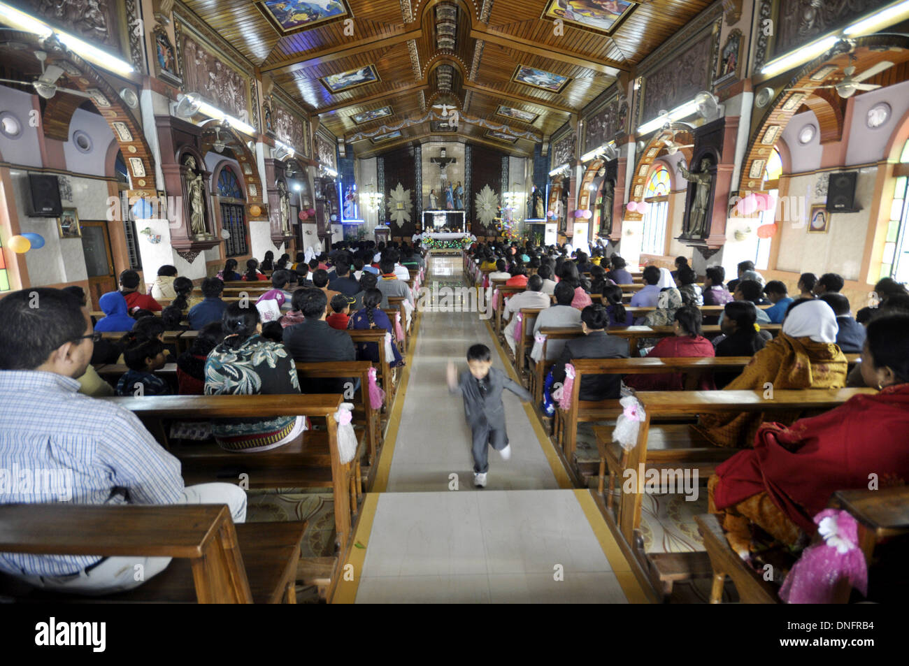 Agartala, Tripura, India. 25th Dec, 2013. The christion people offering ...