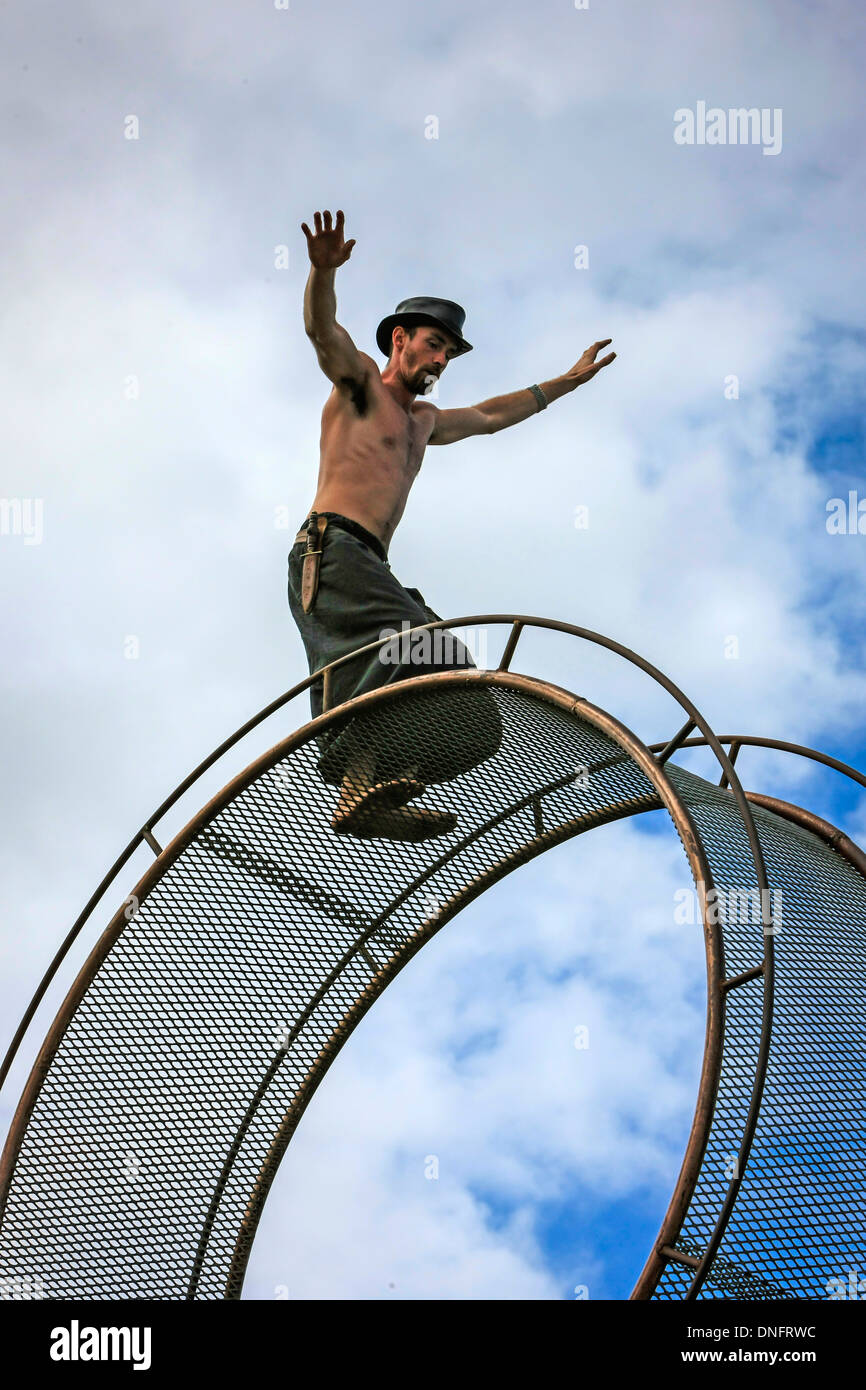 Circus performer entertaining the public with his hamster wheel Stock ...