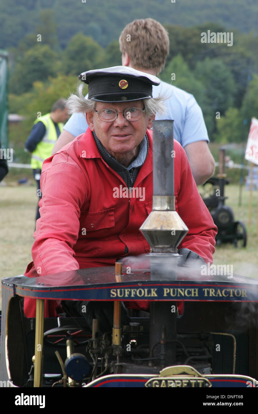 man male driver riding a tiny vintage traction engine Stock Photo - Alamy