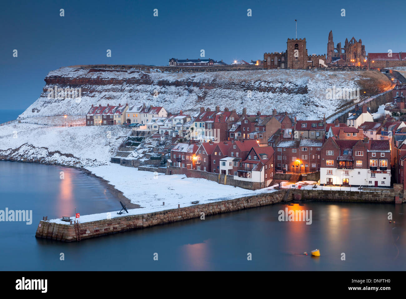 Winter dawn breaking over the river Eske in Whitby on the Yorkshire ...