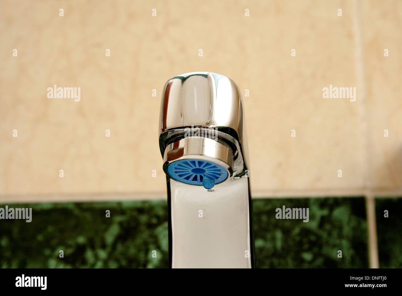 Silver Water Tap in the Bathroom Stock Photo - Alamy