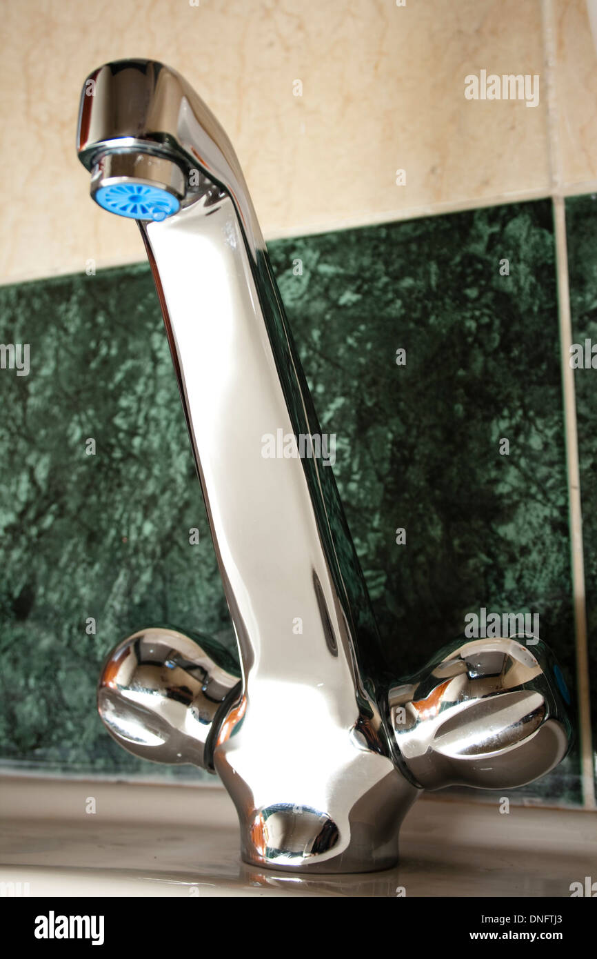 Silver Water Tap in the Bathroom Stock Photo - Alamy