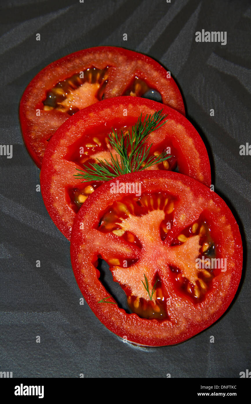 Sliced red tomatoes hi-res stock photography and images - Alamy