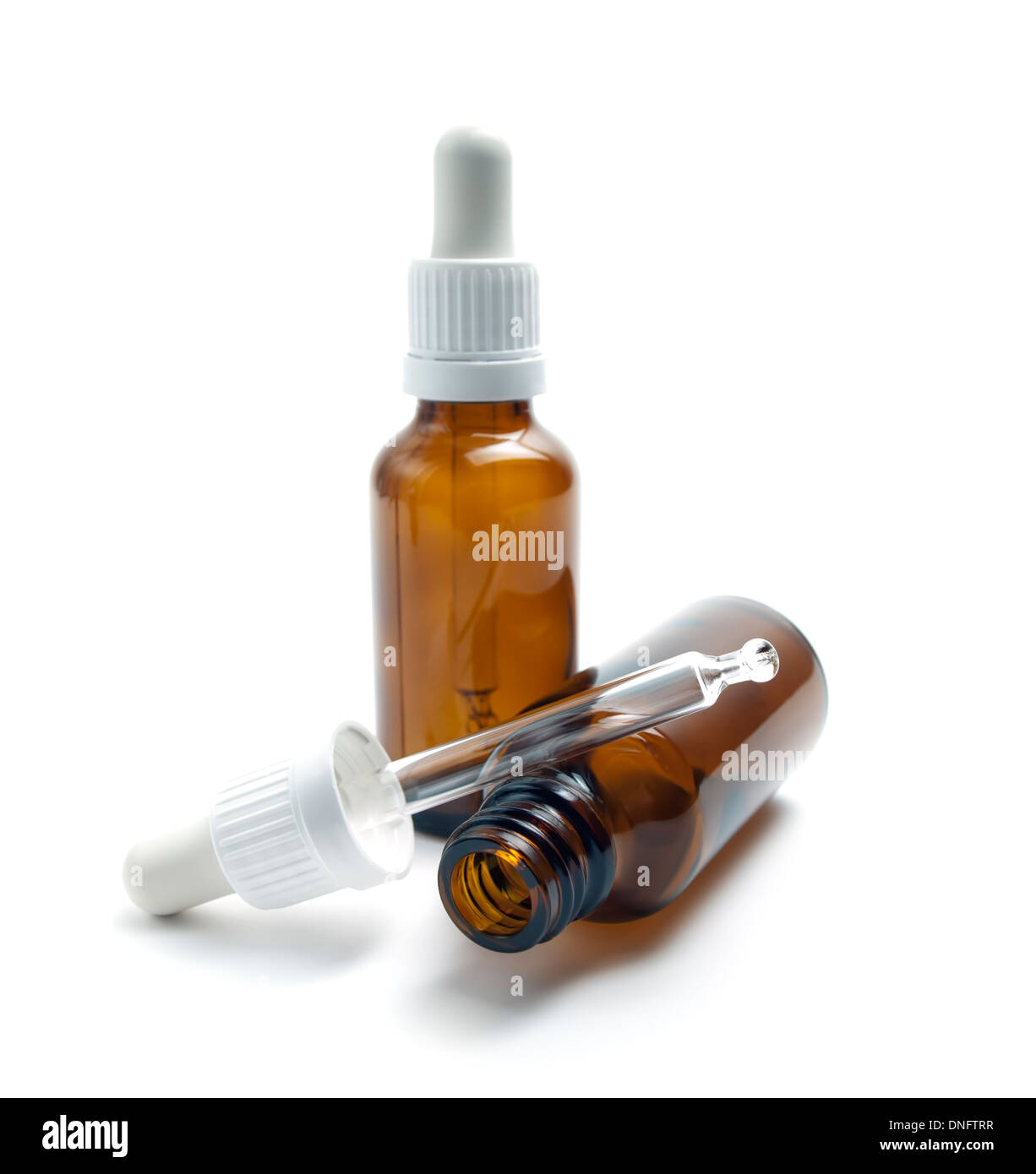 Two pharmaceutical bottle with dropper on white background Stock Photo ...