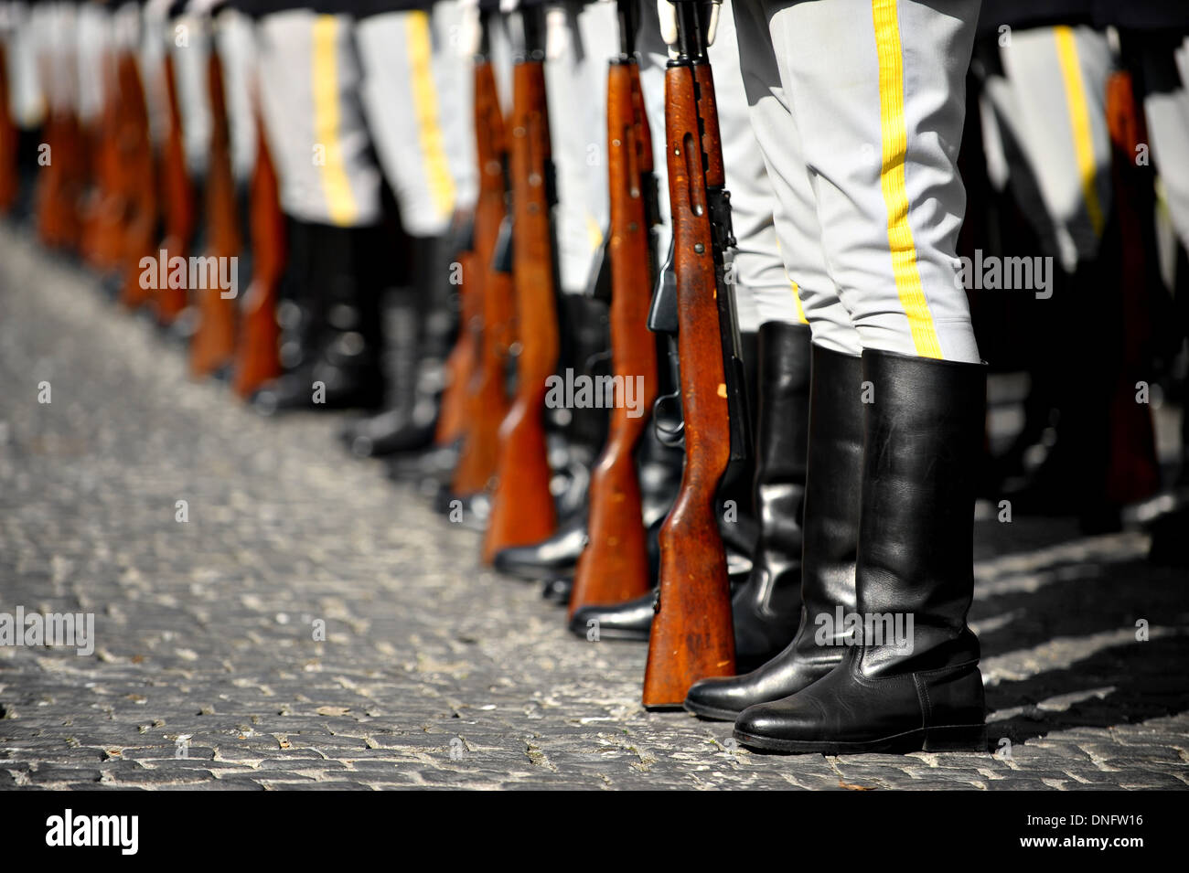 Soldiers in rifle rest position during a military parade Stock Photo ...