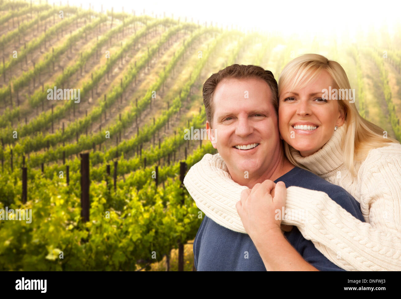 Happy Affectionate Couple Hugging at a Beautiful Wine Vineyard Stock ...