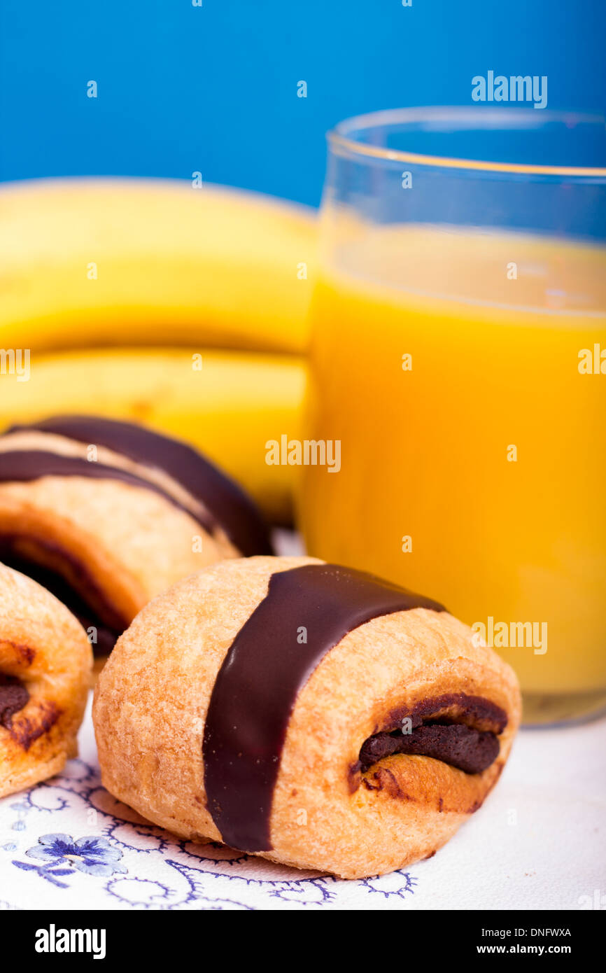 neapolitan chocolate and fruit banana on wood background Stock Photo ...