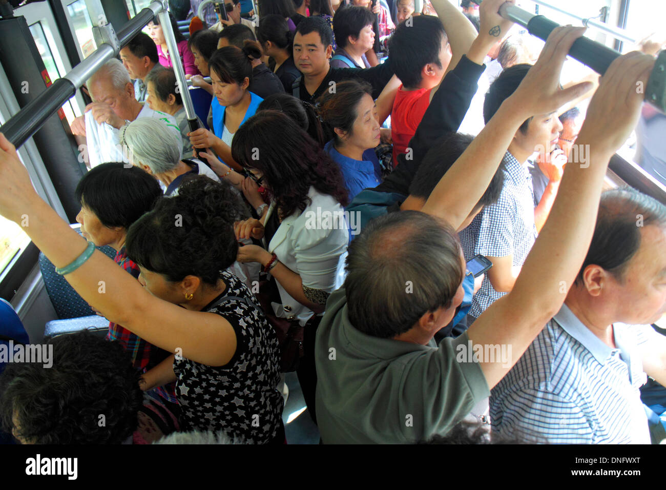 Passengers crowded bus hi-res stock photography and images - Alamy