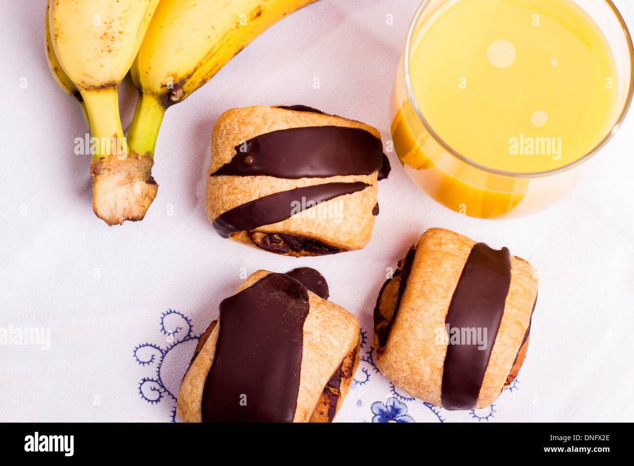 neapolitan chocolate and fruit banana on wood background Stock Photo ...