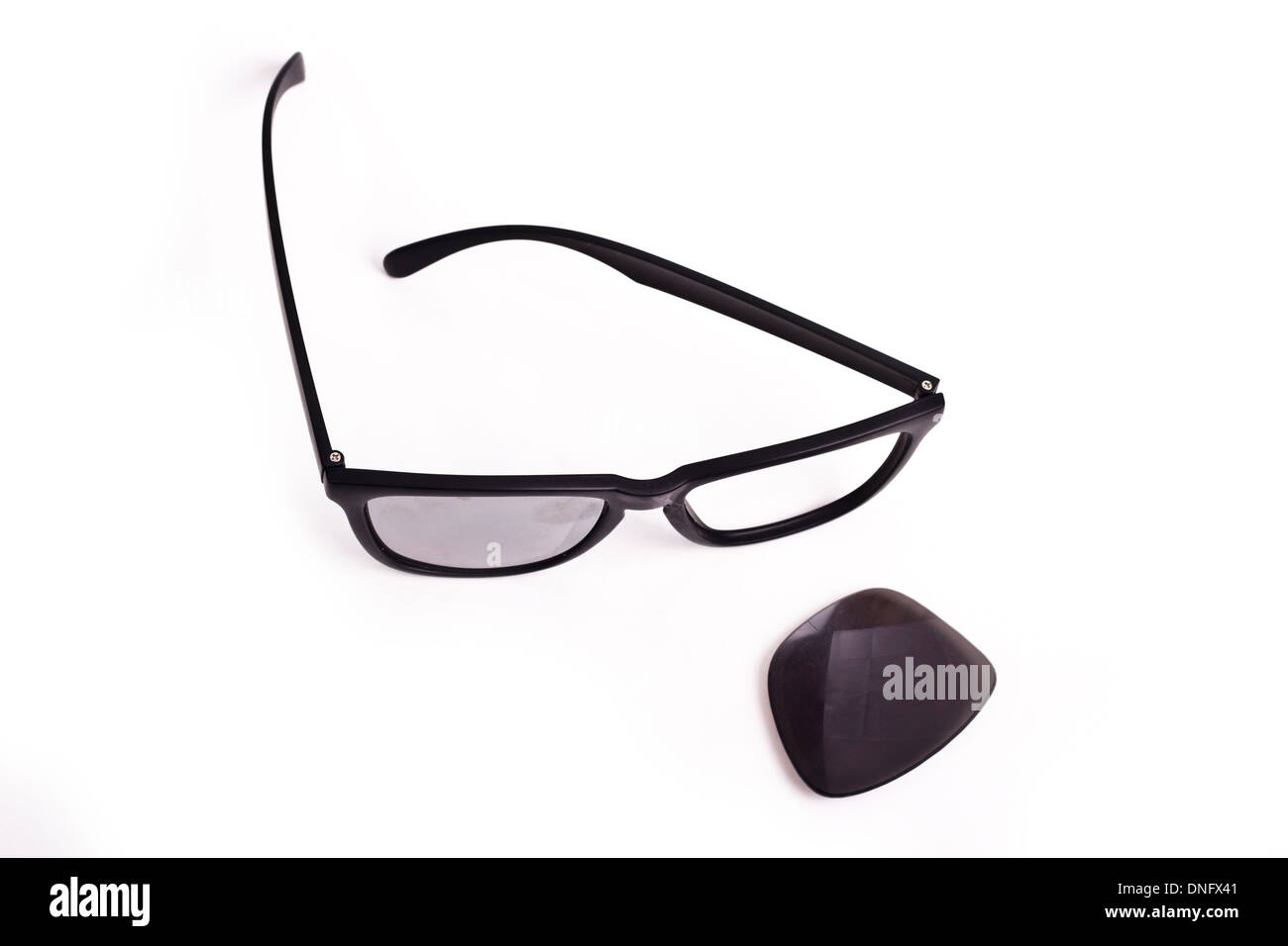 Broken sun glasses on white background Stock Photo - Alamy