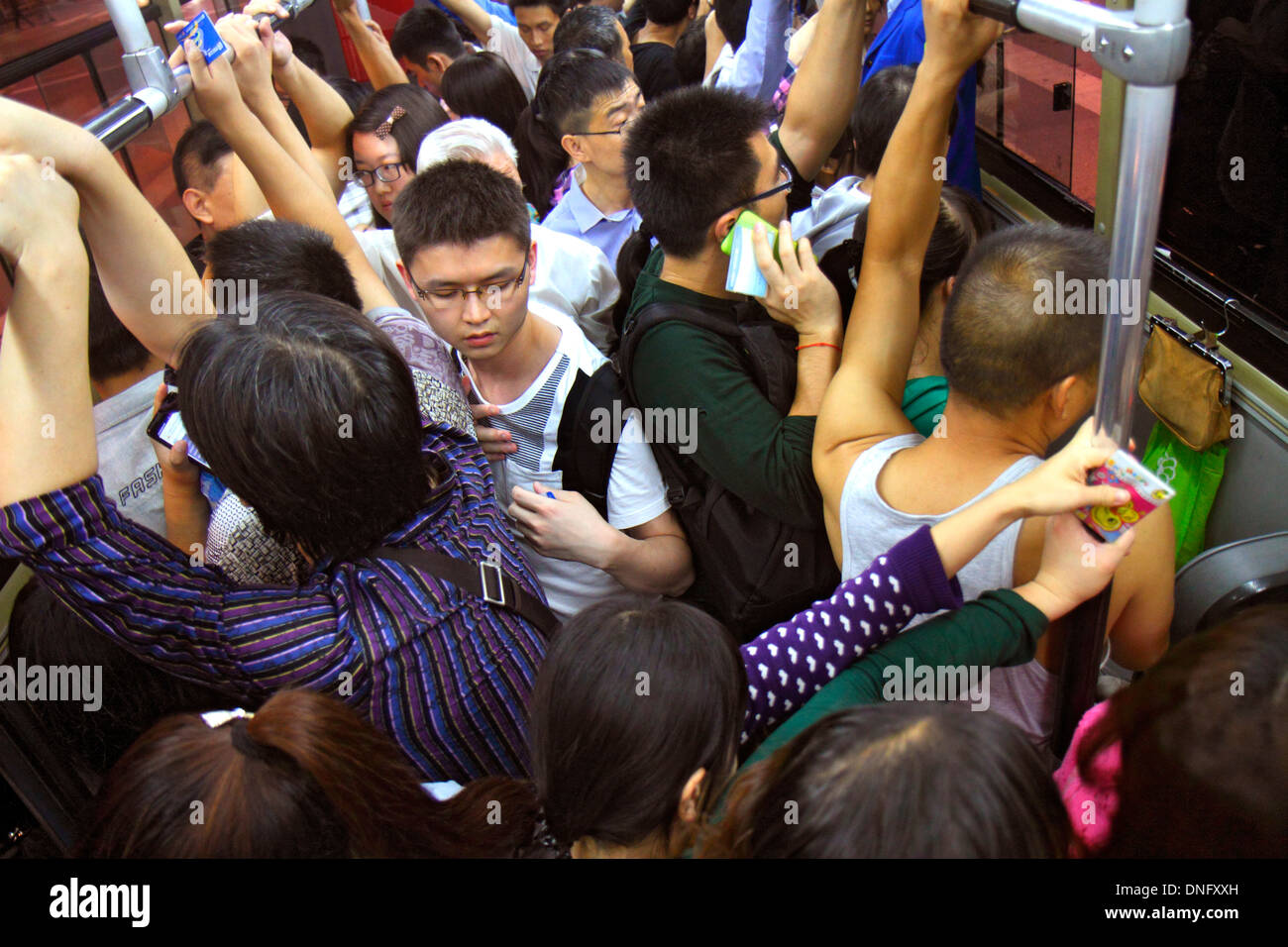 Very crowded bus hi-res stock photography and images - Alamy