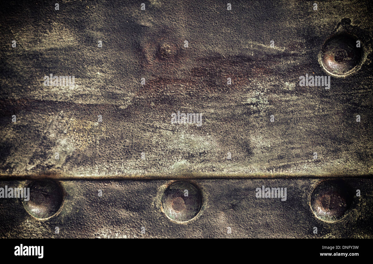 grunge metal plate or armour texture with rivets as background Stock ...