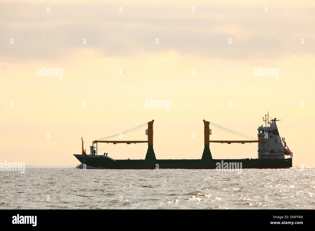 Transportation, cargo container ship sailing in still water heading for ...