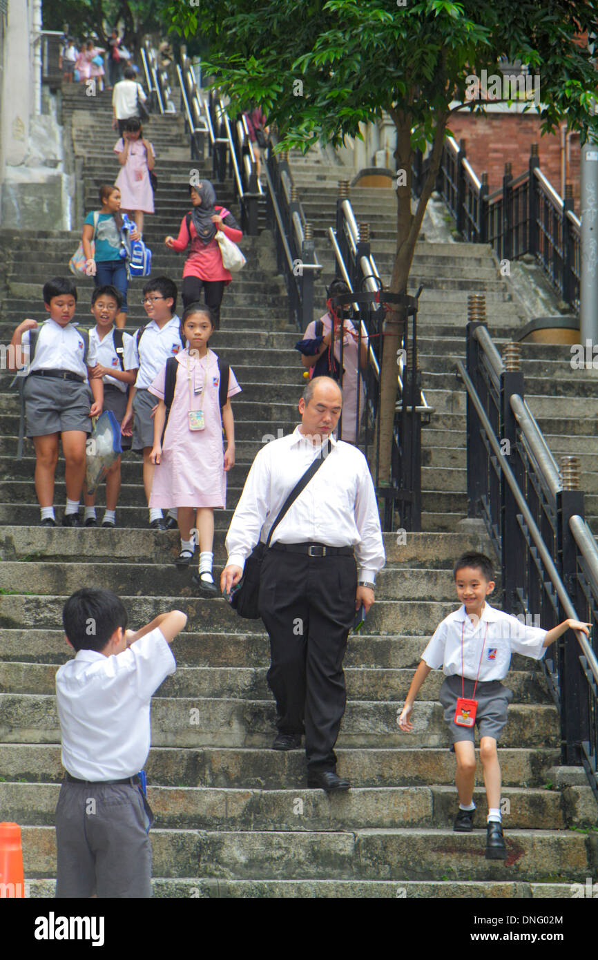 Chinese man walking up stairs hi-res stock photography and images - Alamy