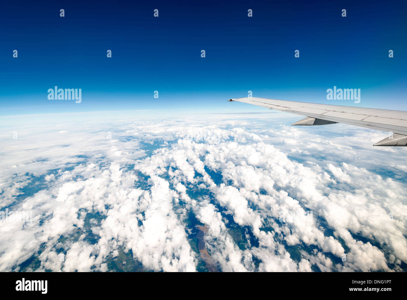 Wing aircraft in altitude during flight Stock Photo - Alamy
