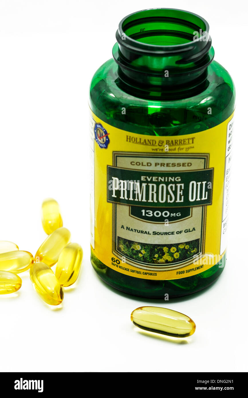 Primrose oil capsules container cut out against white background Stock ...