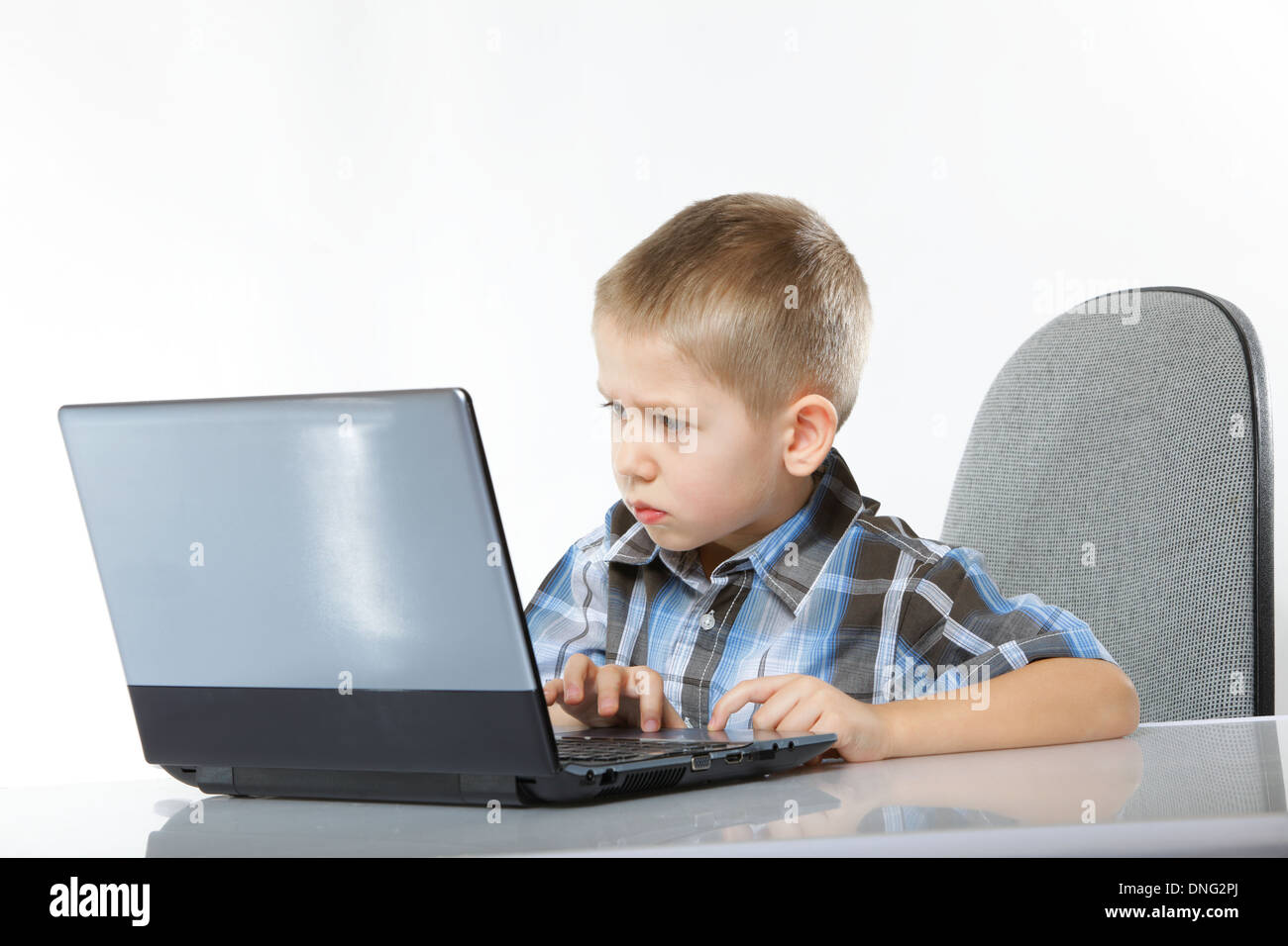 Computer addiction child boy with laptop notebook white background ...