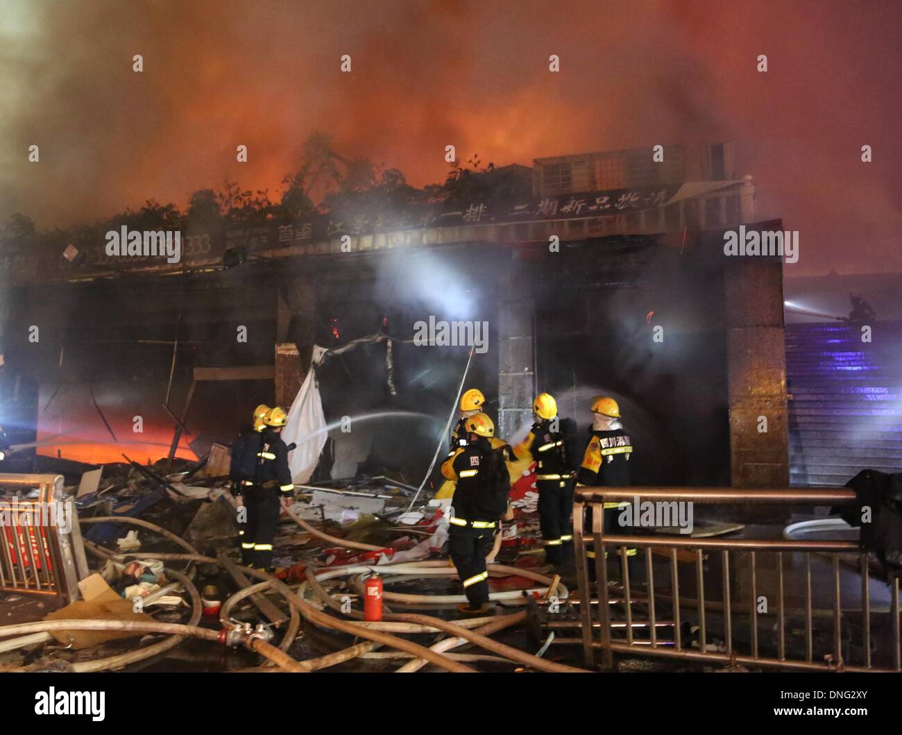 Luzhou, China's Sichuan Province. 27th Dec, 2013. Rescuers work at the ...