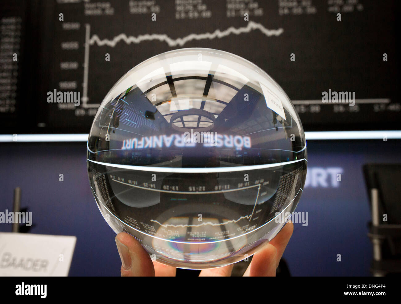 ILLUSTRATION - A crystal ball, being used to tell the future, is held ...