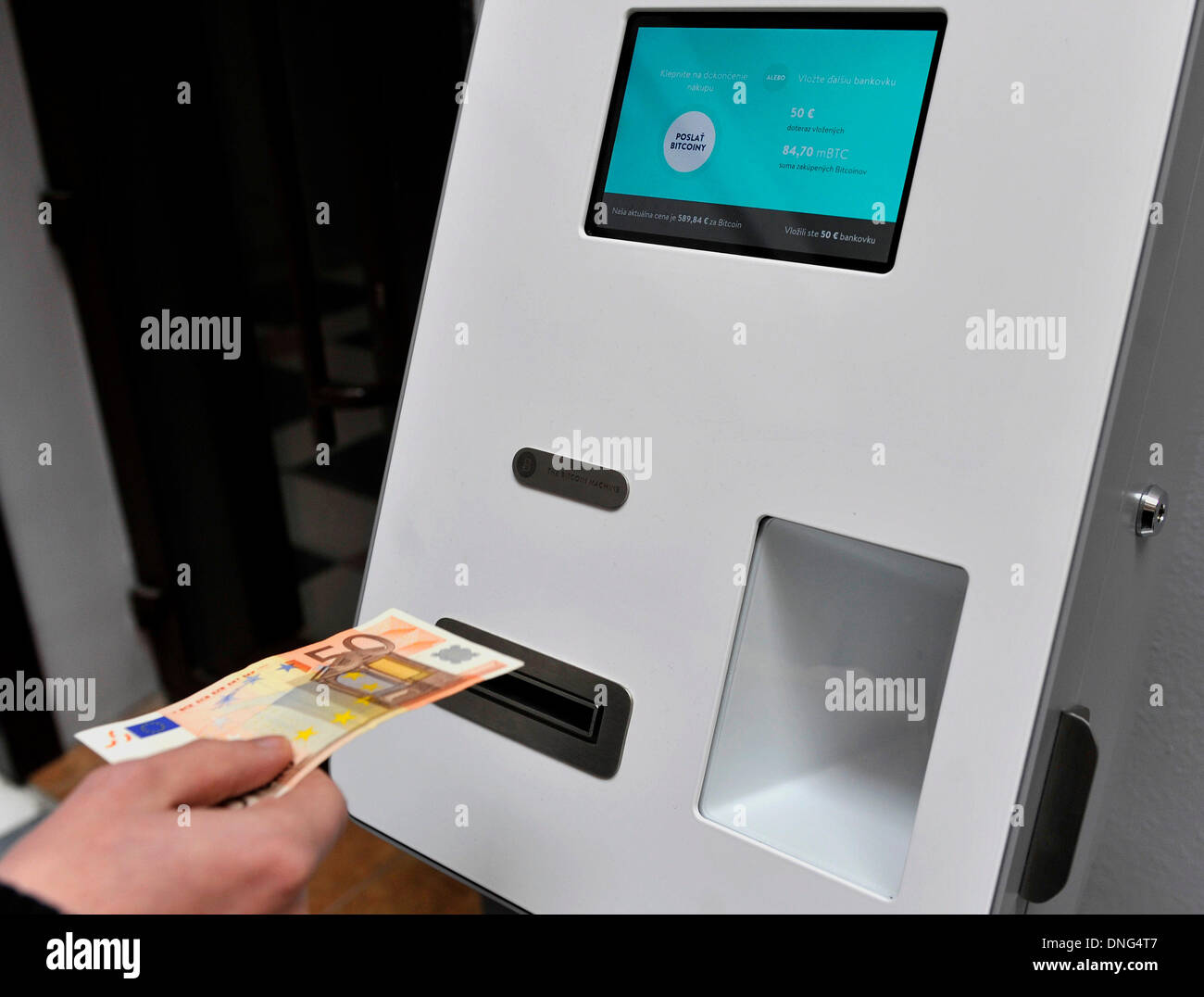 The installation of the first ATM machine dispensing digital currency ...