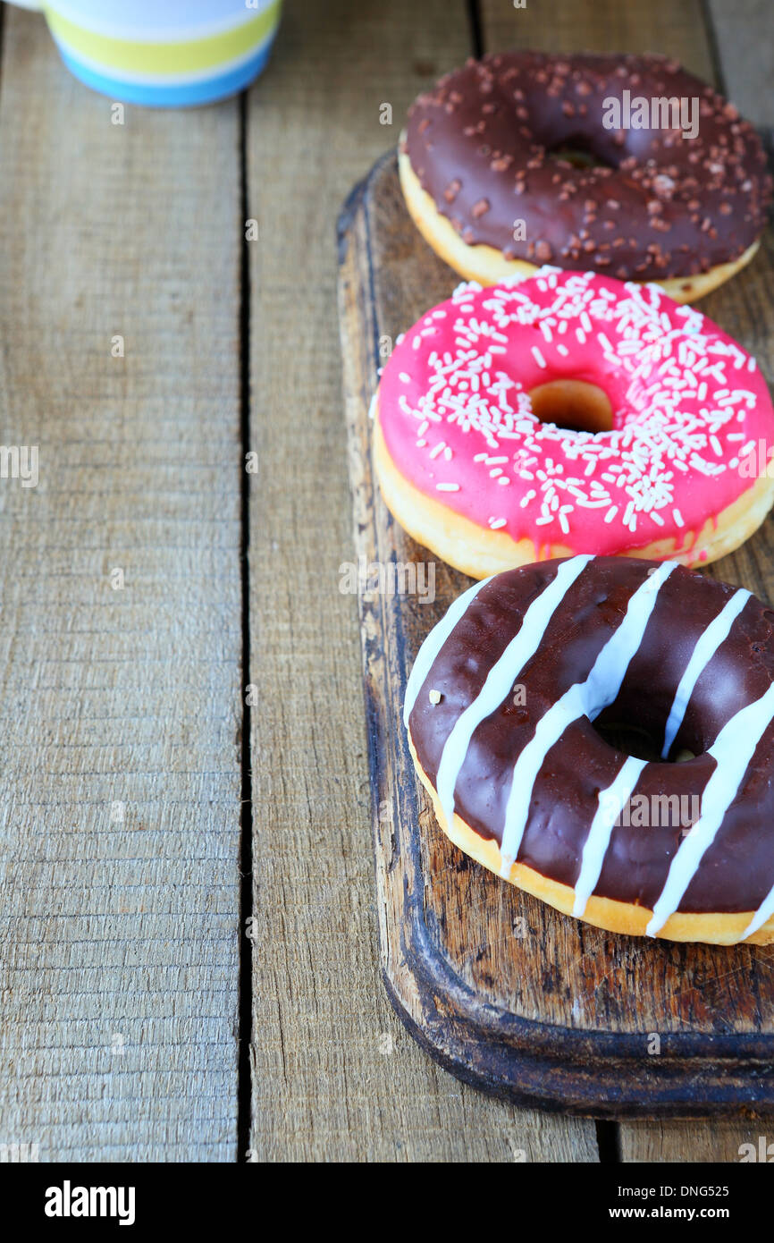 round donuts with icing, food closeup Stock Photo - Alamy