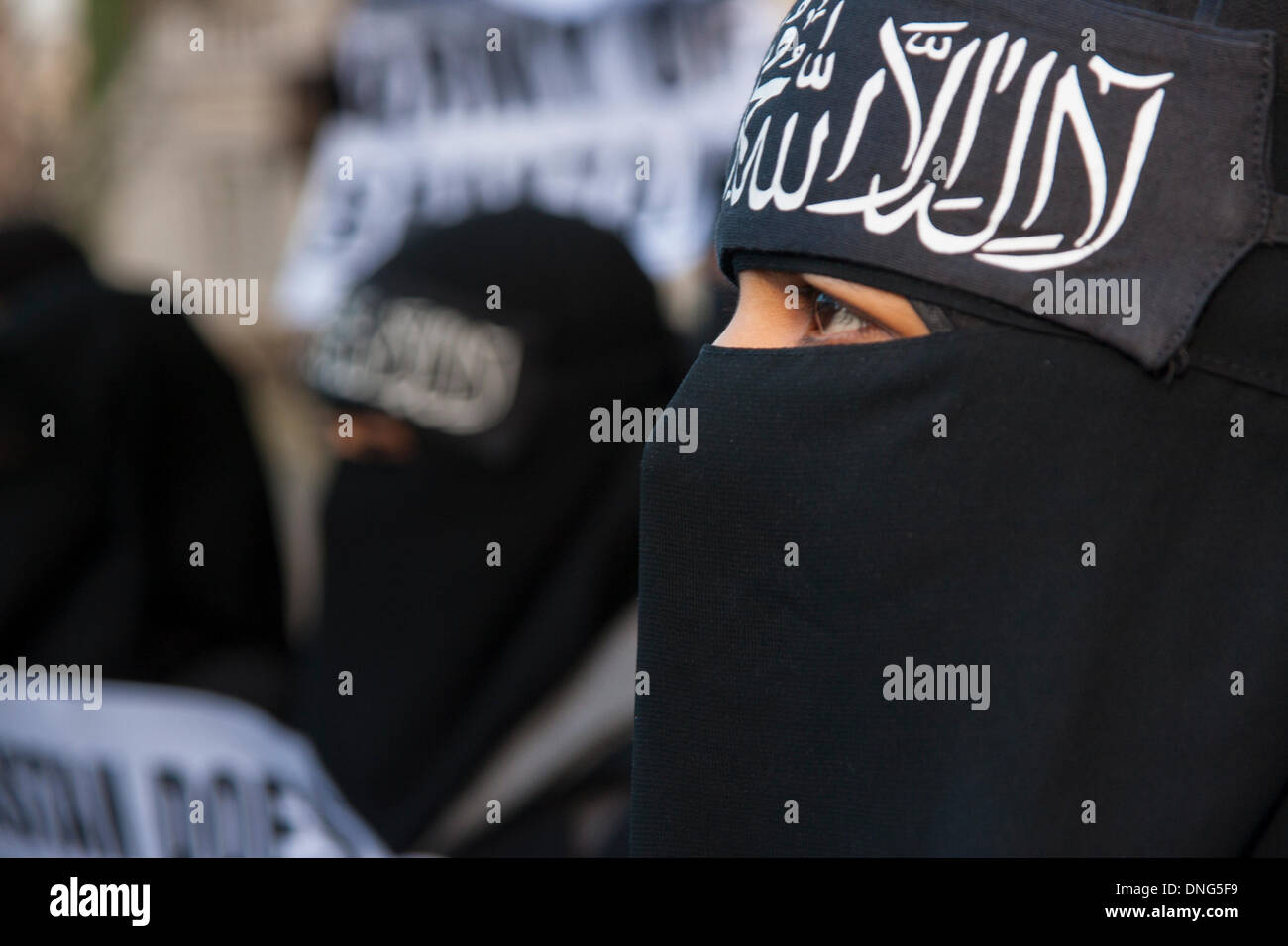 London, December 27th 2013. Anjem Choudary's hard line Muslim followers ...