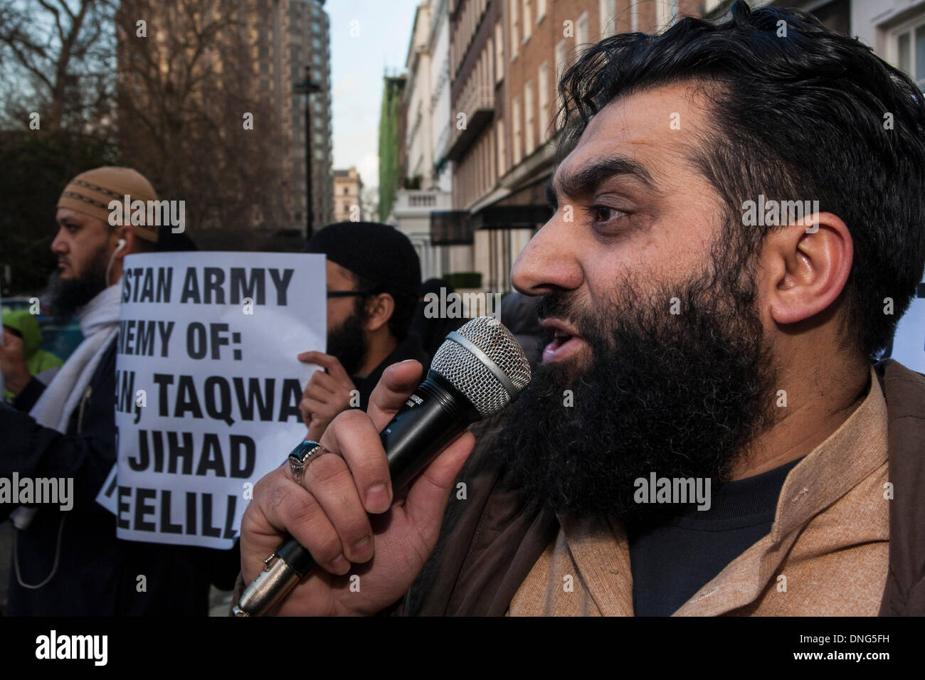 London, December 27th 2013. Anjem Choudary's hard line Muslim followers ...