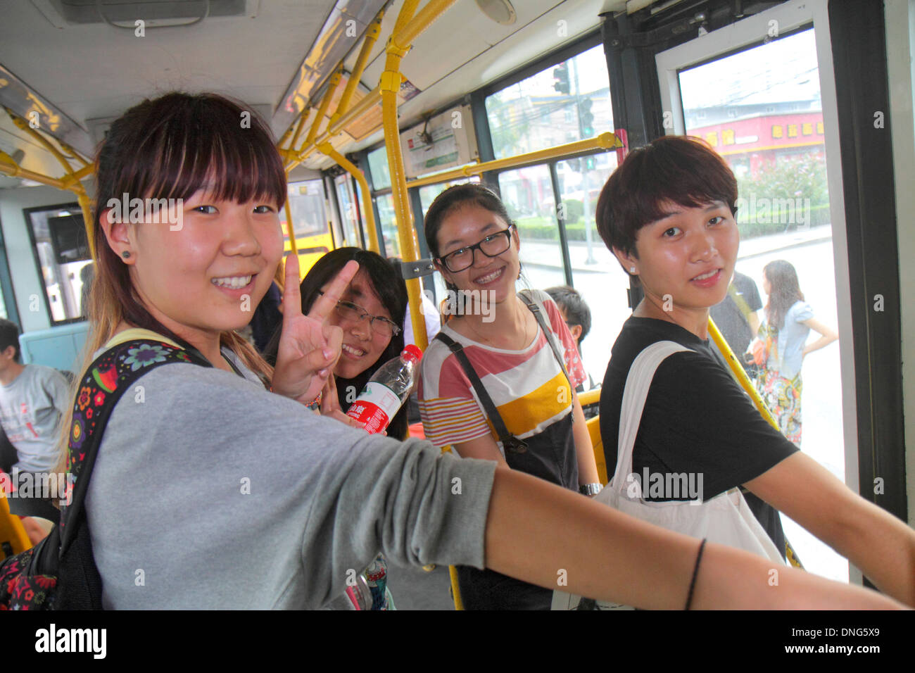 Lady standing hi-res stock photography and images - Alamy