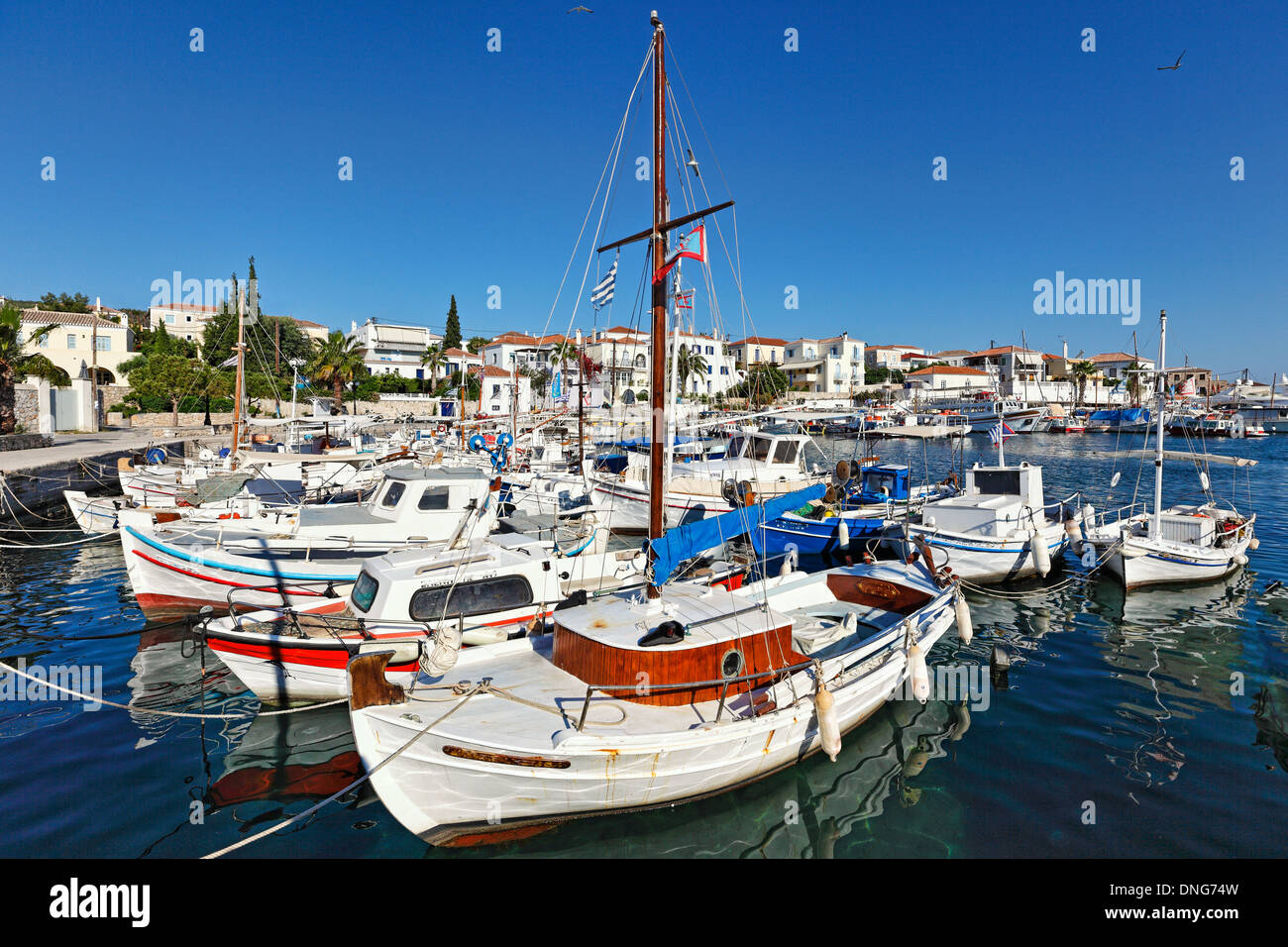 Boats in the old port of Spetses island, Greece Stock Photo - Alamy