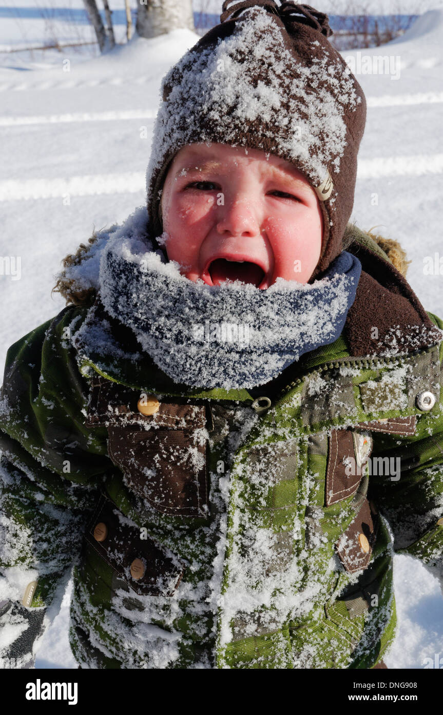 A 20 moth old baby boy crying after falling face first into snow (and ...