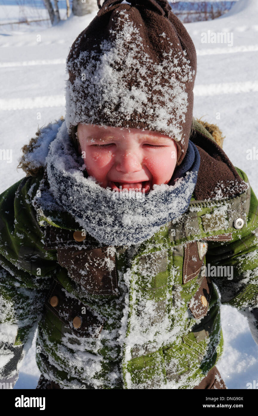 A 20 moth old baby boy crying after falling face first into snow (and ...