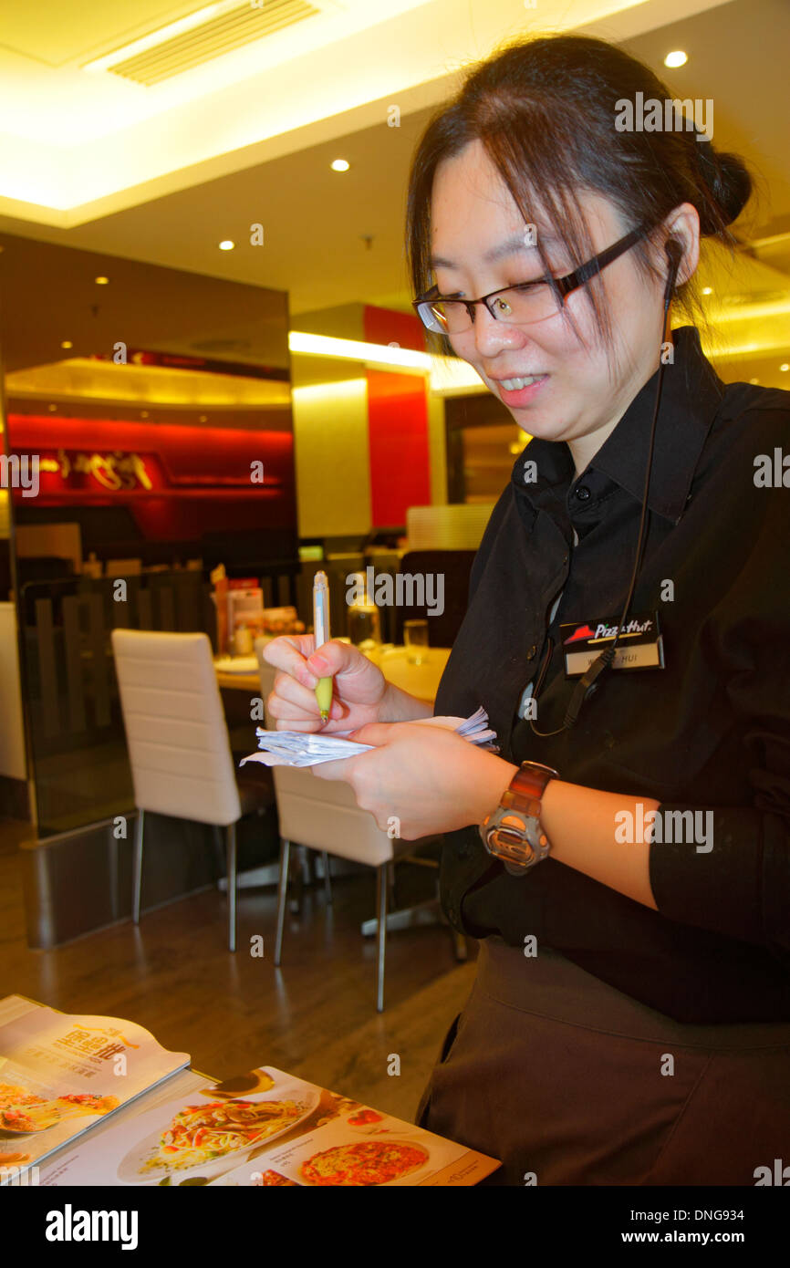 Waitress in chinese restaurant in hi-res stock photography and images ...