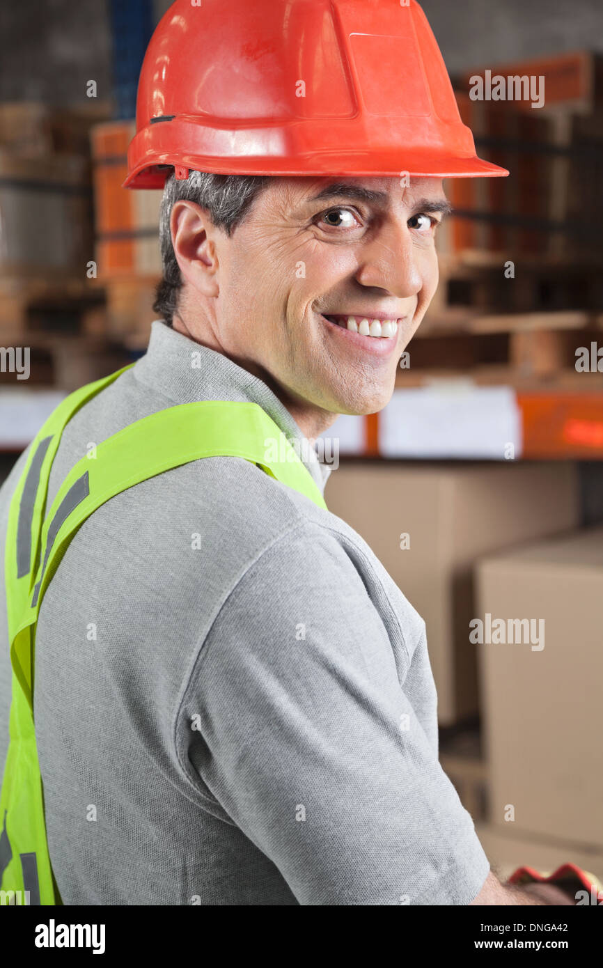 Happy Foreman At Warehouse Stock Photo - Alamy