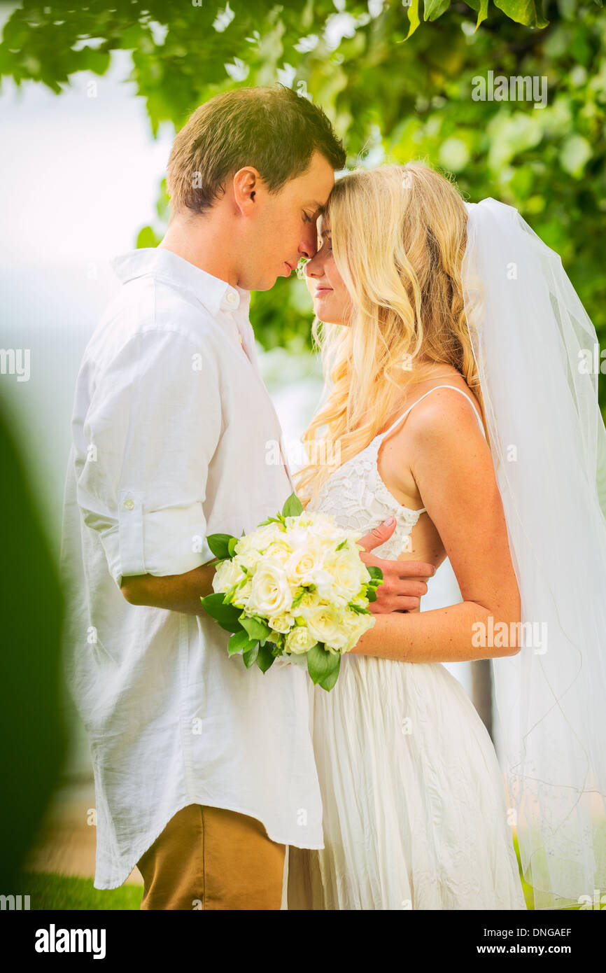 Just married couple kissing and embracing, Intimate loving moment at ...