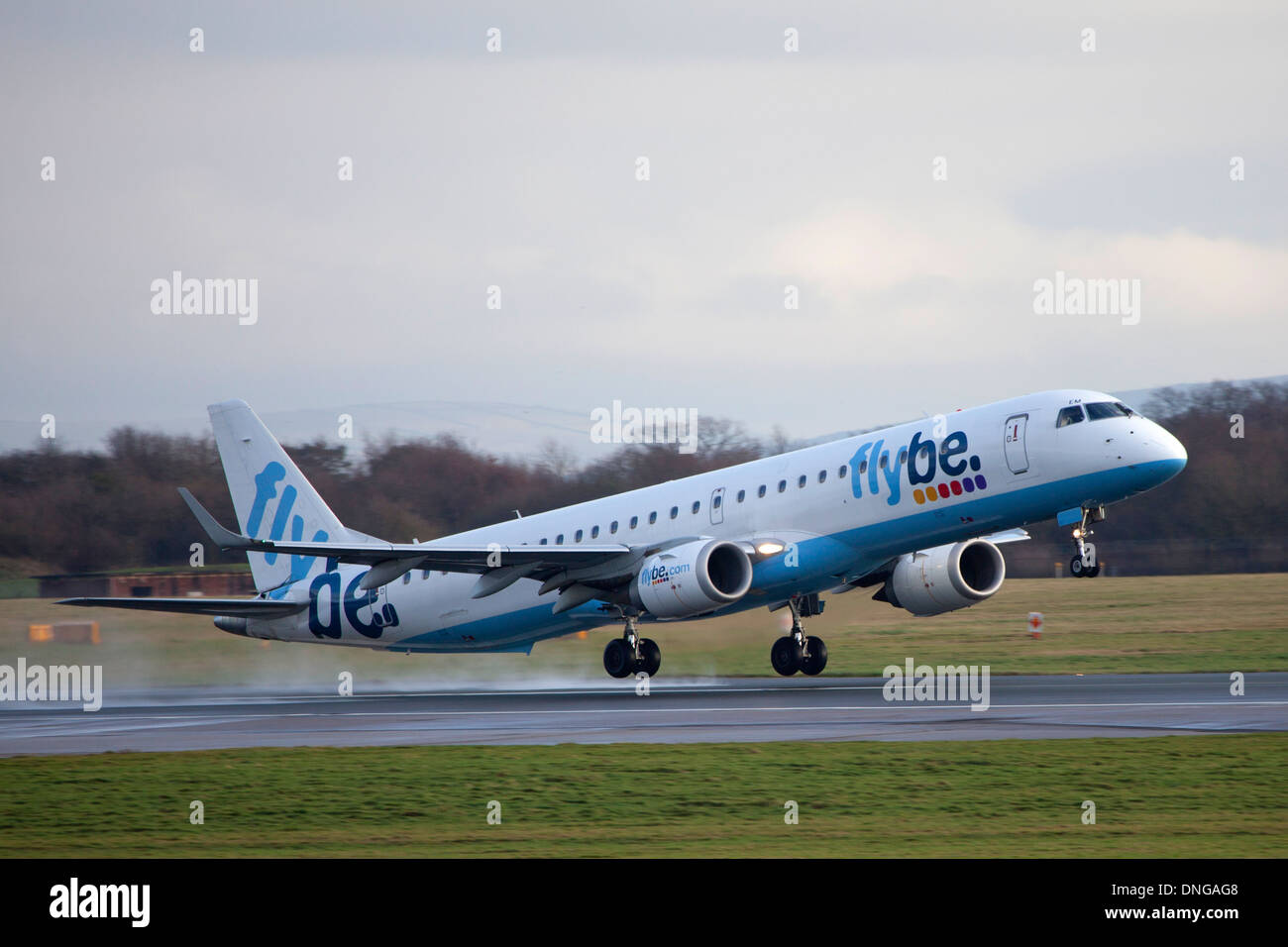 Flybe aeroplane taking off at Manchester Airport Stock Photo - Alamy