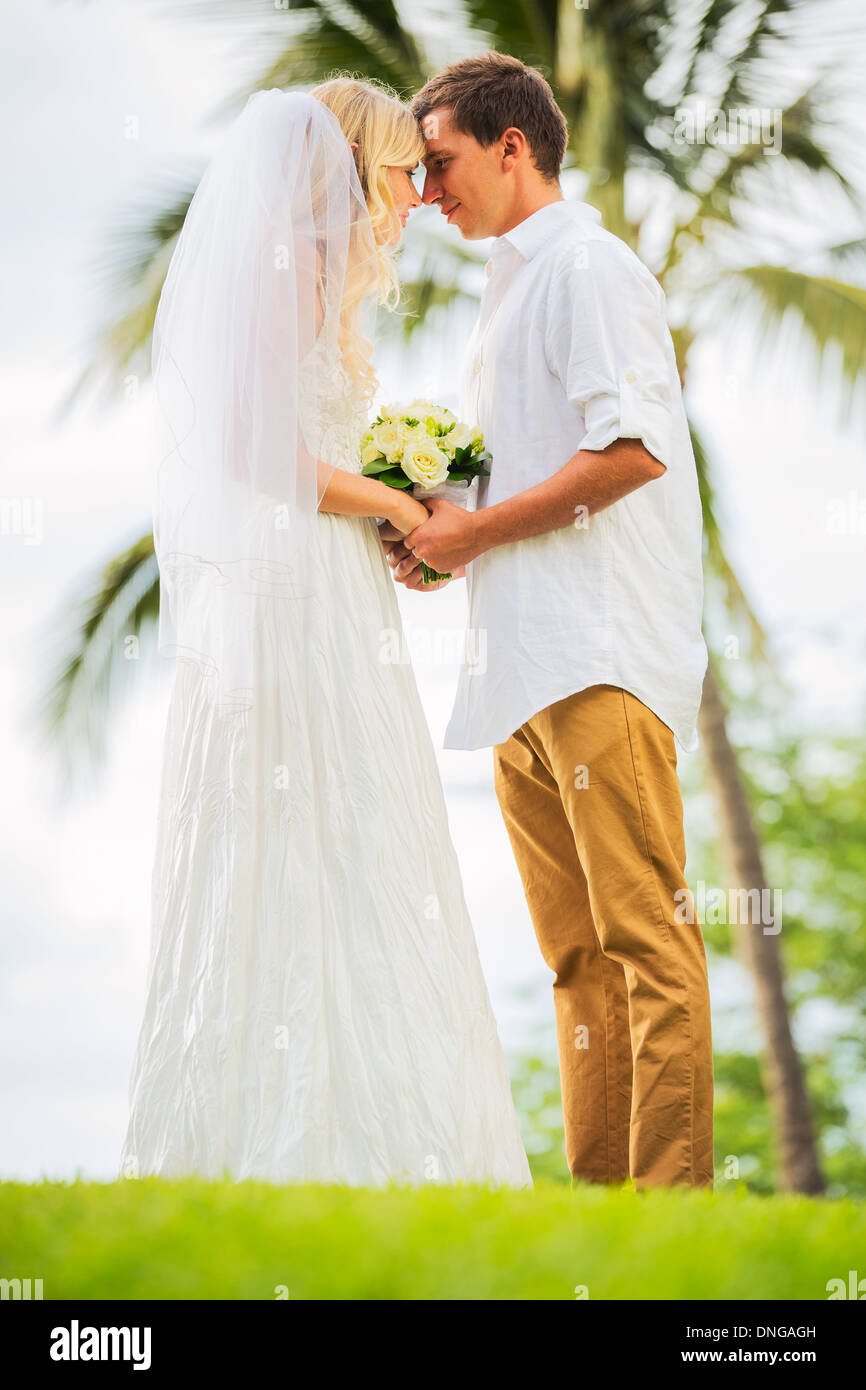 Just married couple holding hands, Intimate loving moment at wedding ...