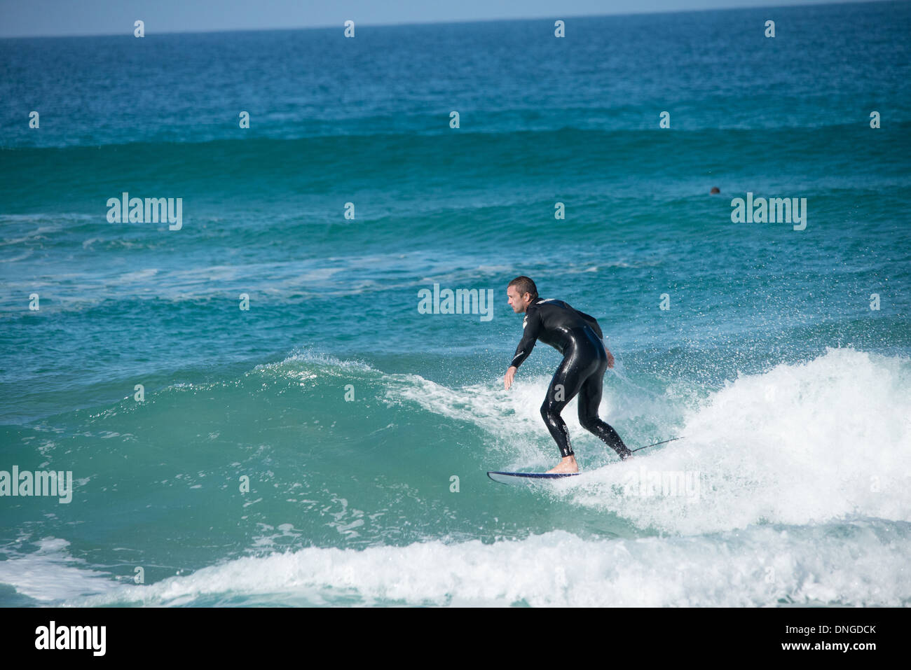 ocean surf photo surfers riding waves Stock Photo - Alamy