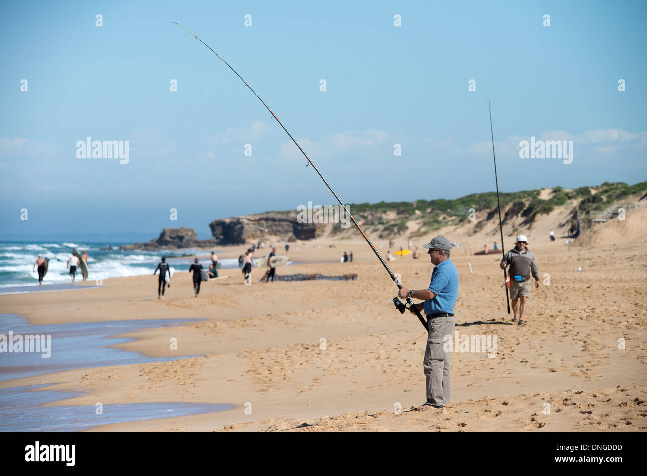 coastal fishing on surf beach Stock Photo - Alamy