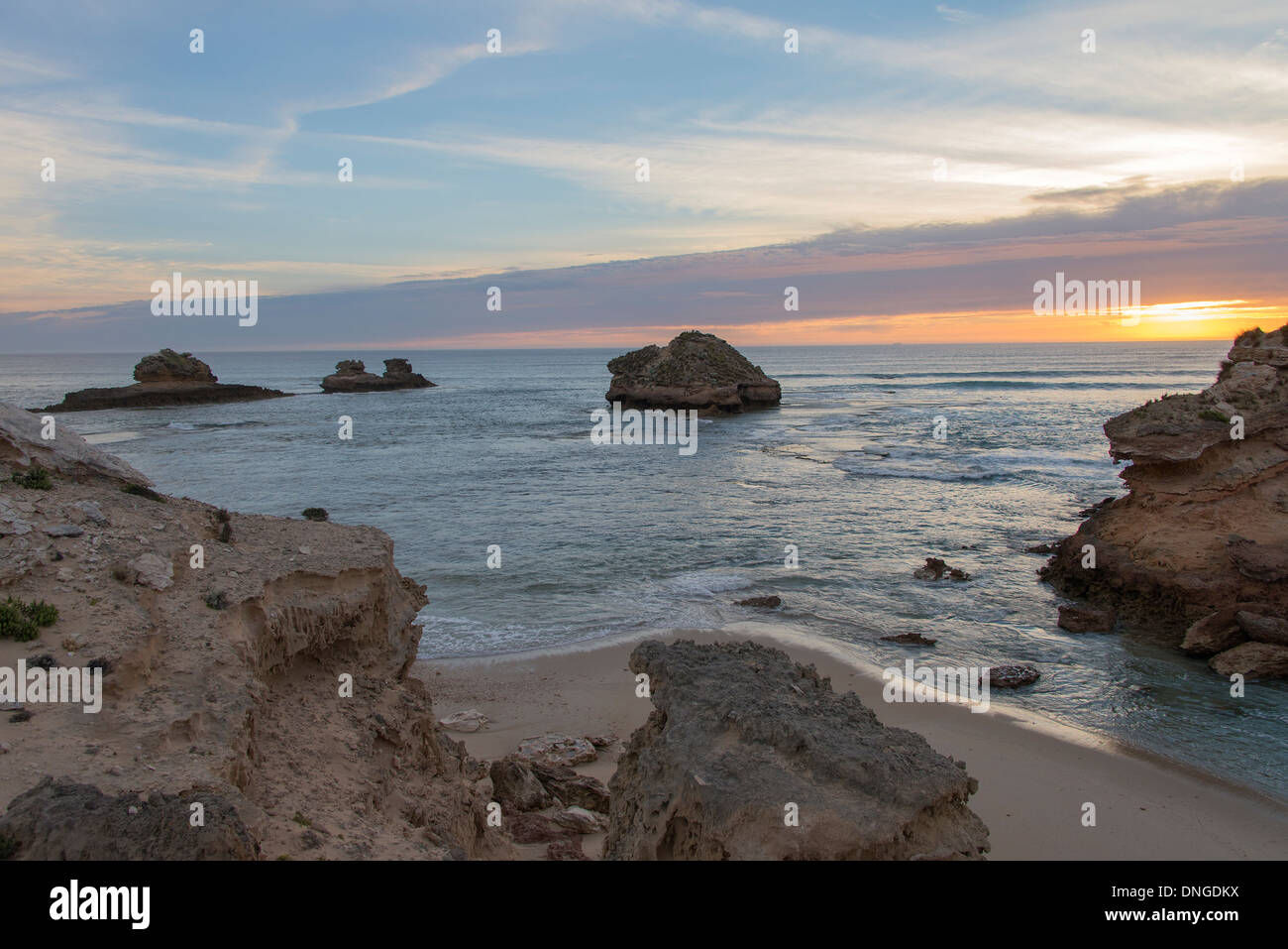 sunset ocean on the beach with iconic rock formations Stock Photo - Alamy